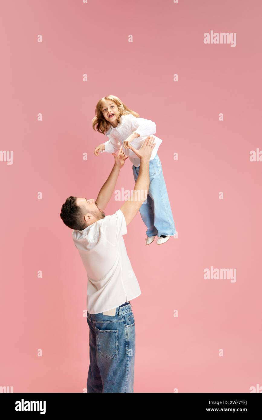 Baby girl lifting shirt up hi-res stock photography and images - Alamy
