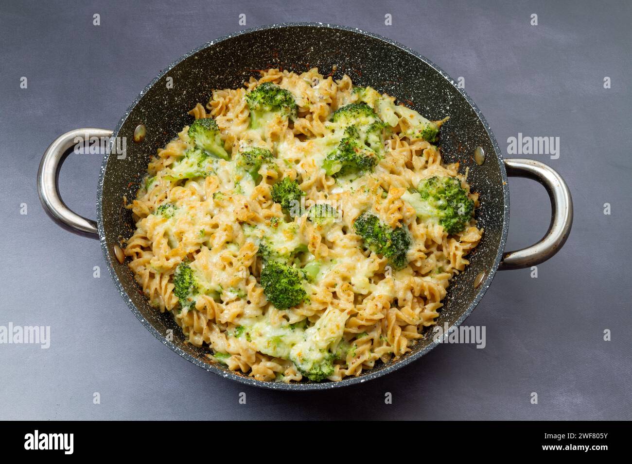 Cheesy broccoli pasta bake from above Stock Photo - Alamy