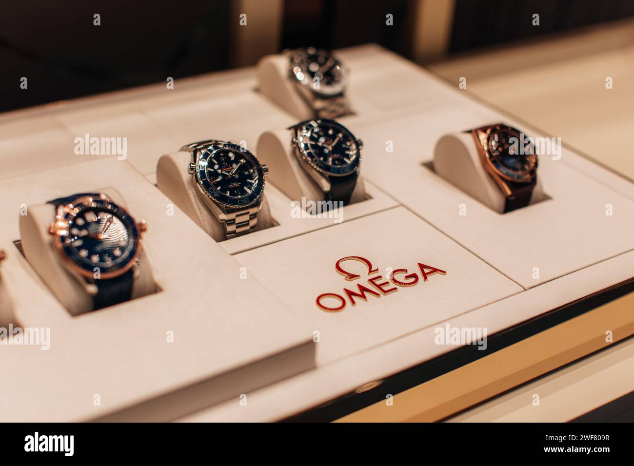 Collection of luxury Omega watches, famous brand shop window display in ...