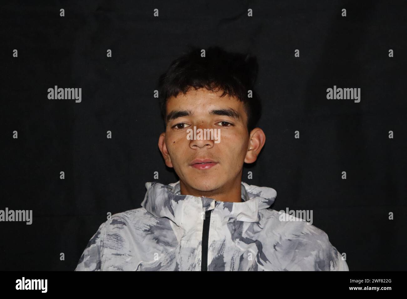 Picture of himalayan adult man with a black backround Stock Photo - Alamy