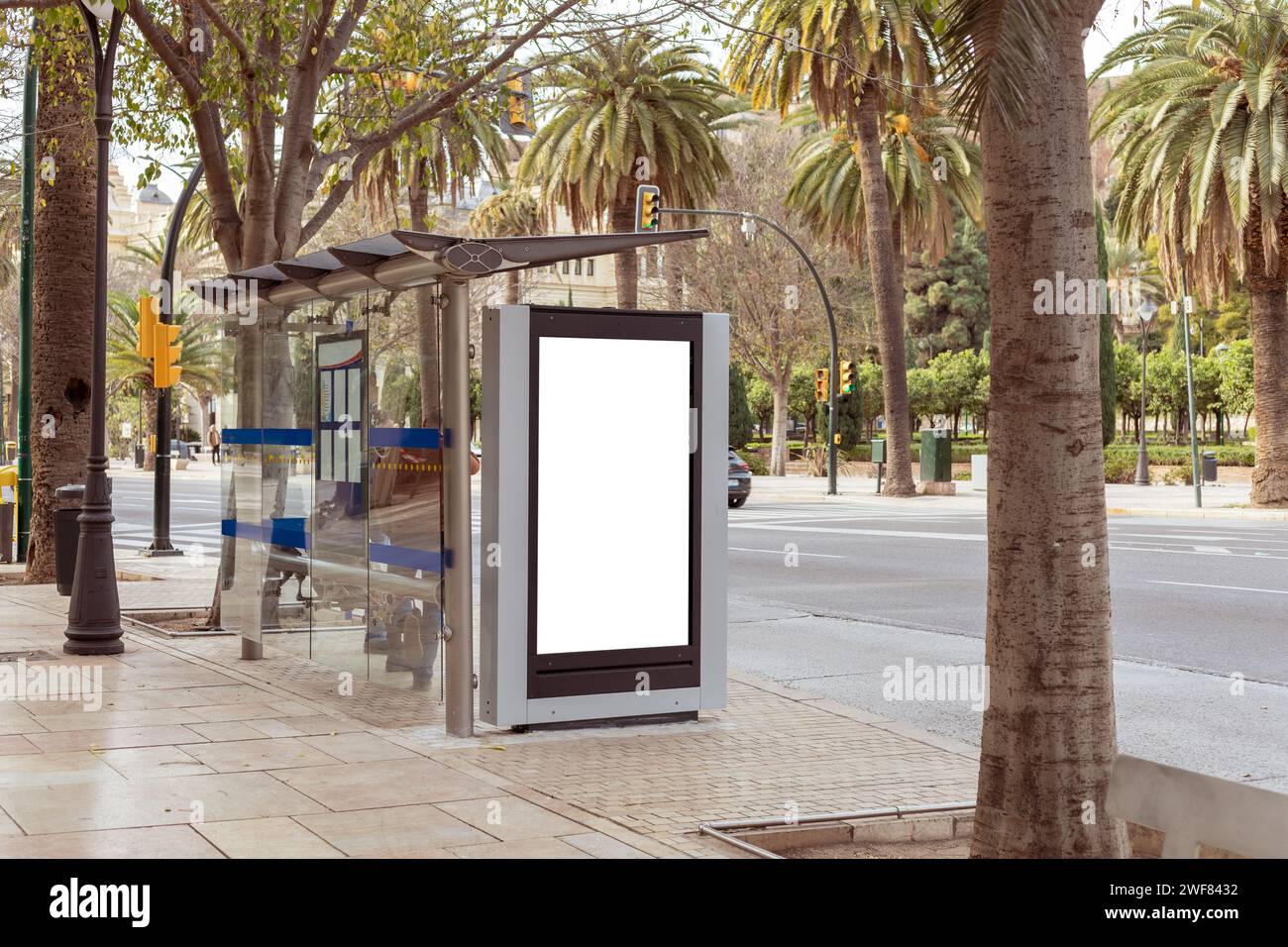 Urban bus stop with an empty advertising billboard ready for ad ...