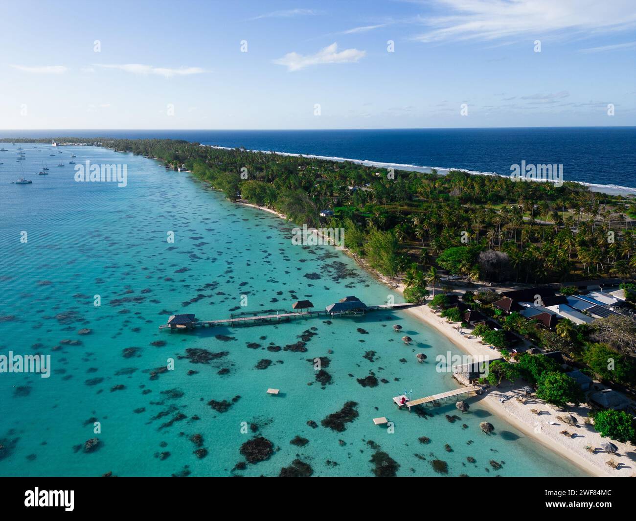 Aerial view of Havaiki Lodge showing lagoon and pacific ocean of ...