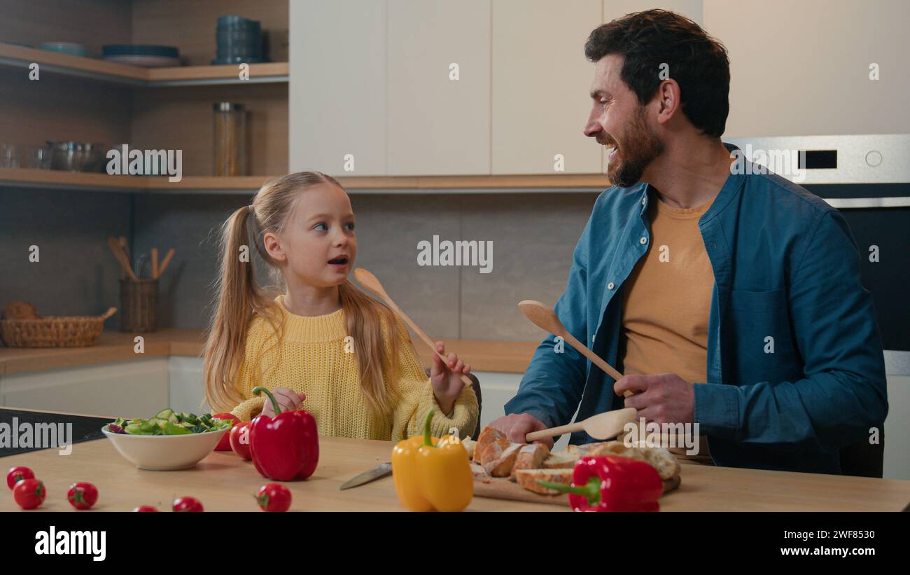 Caucasian family single dad parent fatherhood breakfast dinner cooking ...