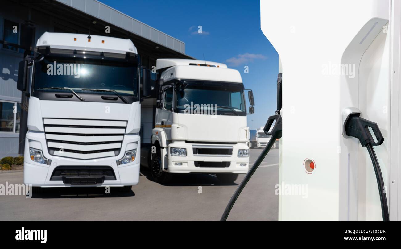 Semi truck fleet at the logistics center Stock Photo - Alamy