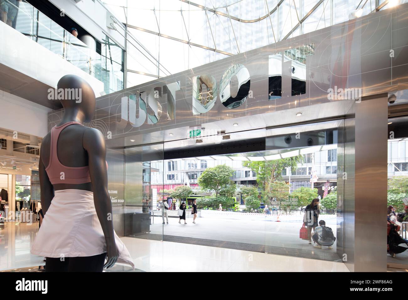 Nike tagline Just Do it at the exit of the store, Singapore. 2024 Stock ...