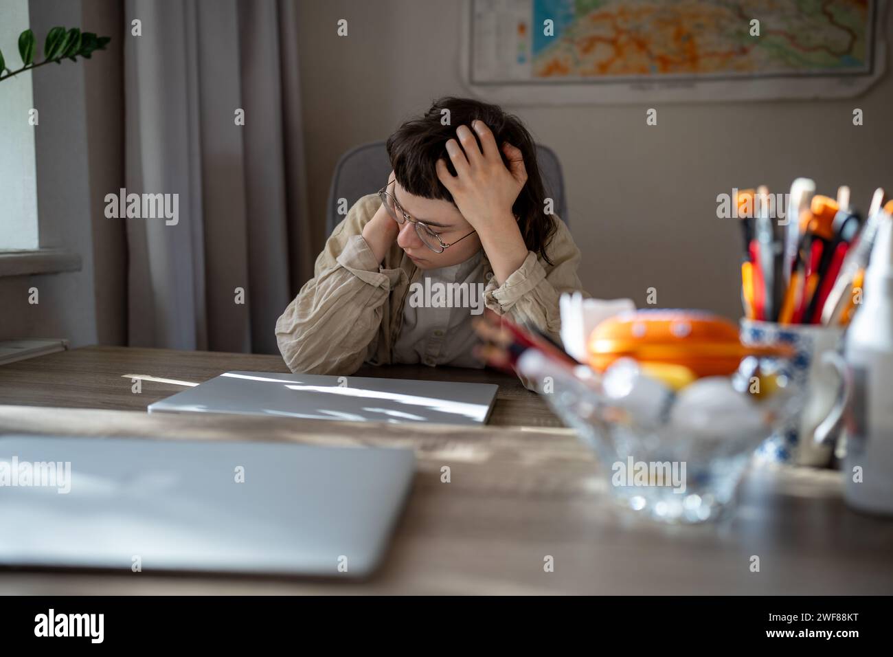 Rundown of fatigue teenage girl having break after hard intellectual ...