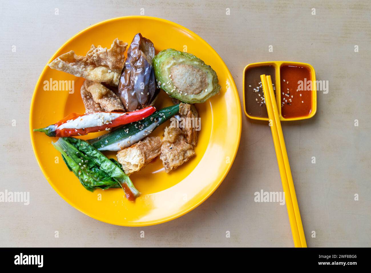 Assorted yong tau fu or tofu, to be dipped with sauces is a favorite ...