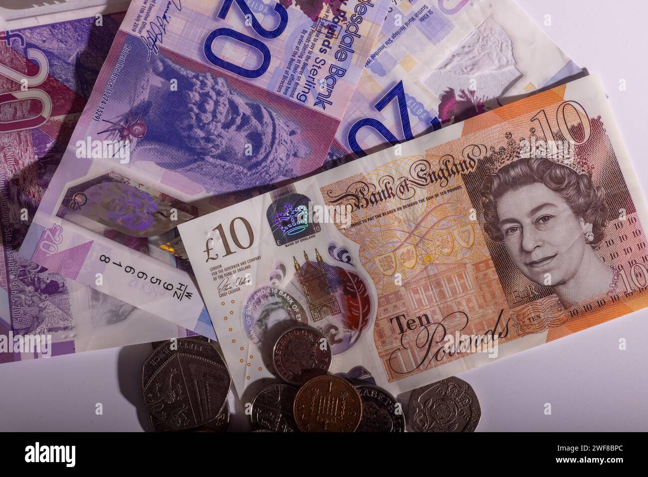 Isolated british pounds notes and coins Stock Photo - Alamy