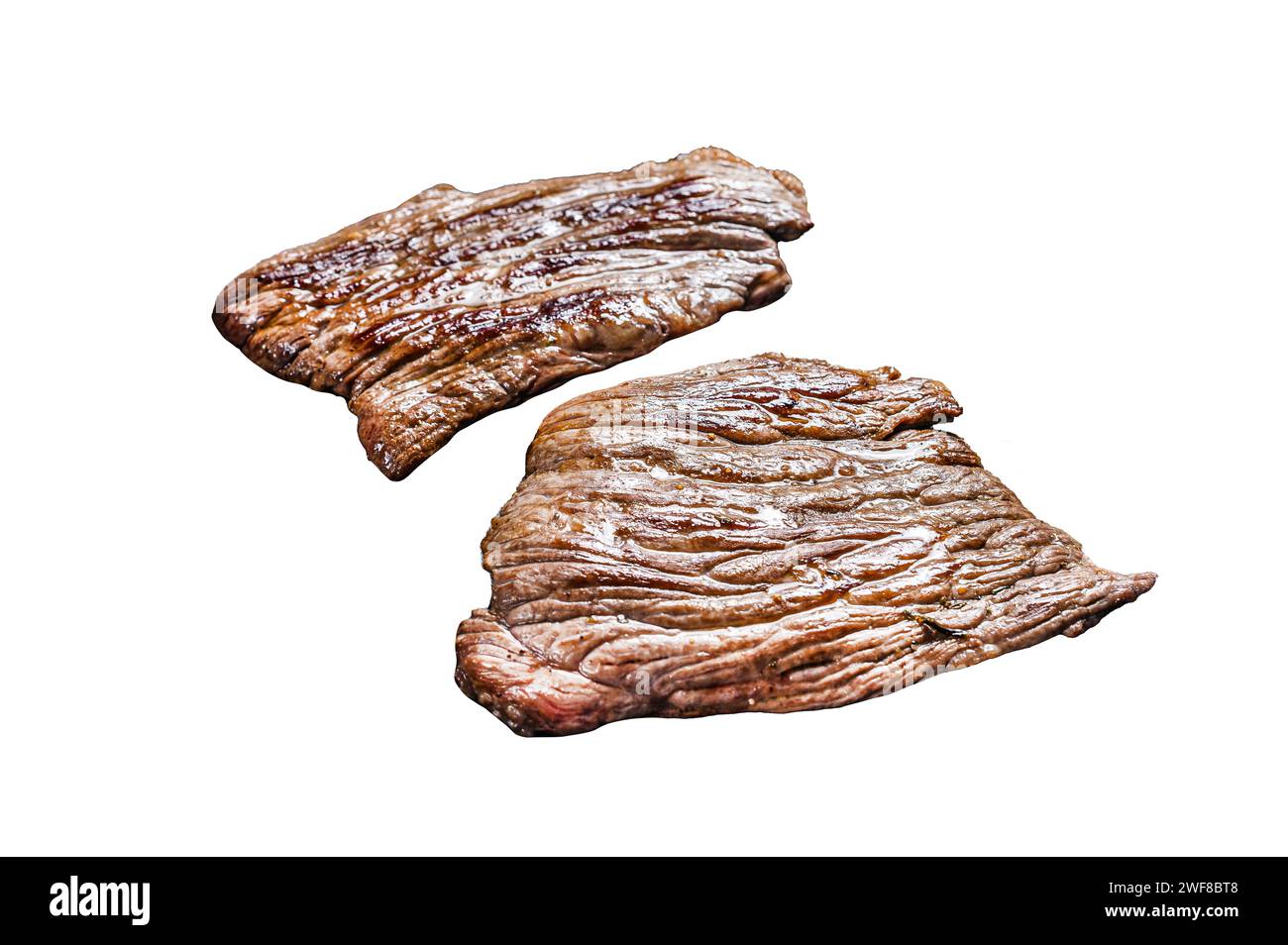 Roasted flat iron and flank steaks. Marble beef meat. Isolated on white ...