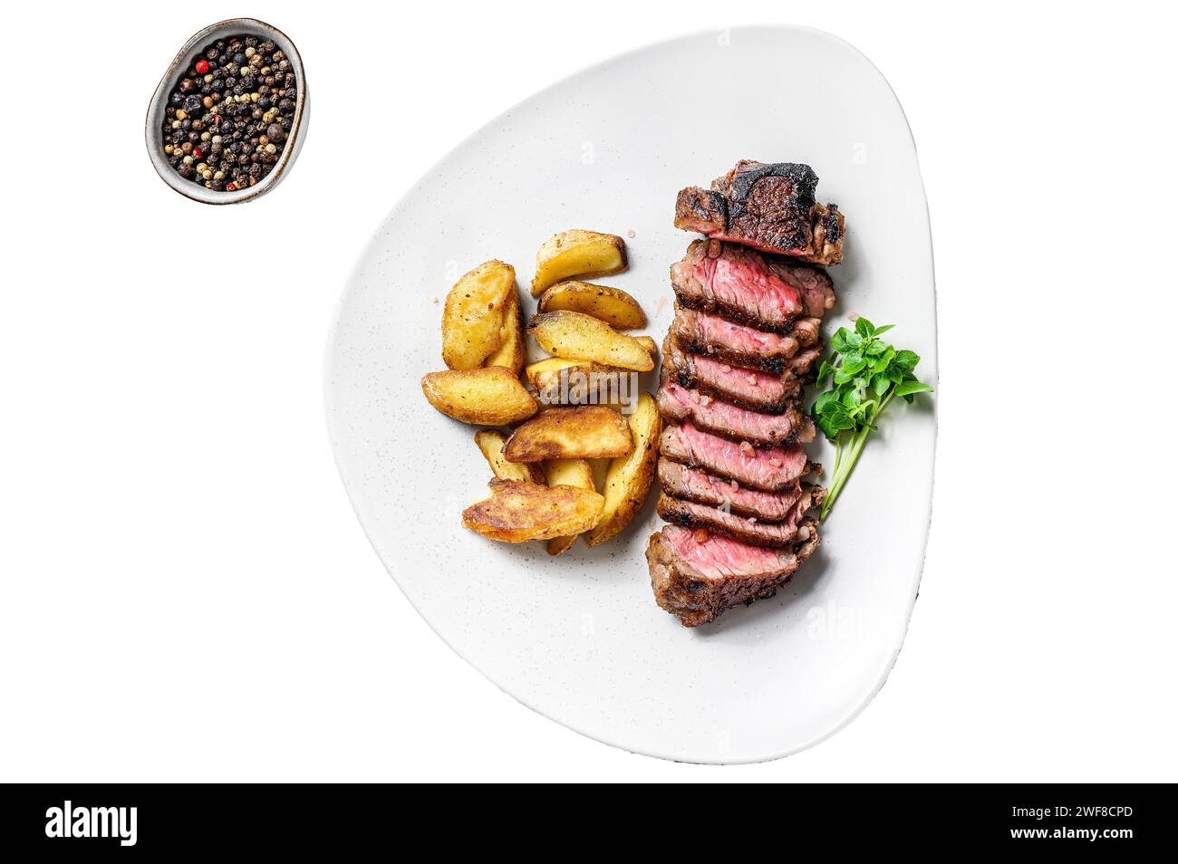 Sliced Grilled rump Beef steak with potato. Isolated on white ...