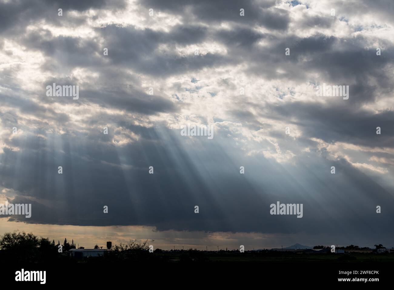 Avgorou, Cyprus. 28th Jan, 2024. Sun rays are coming through the clouds ...