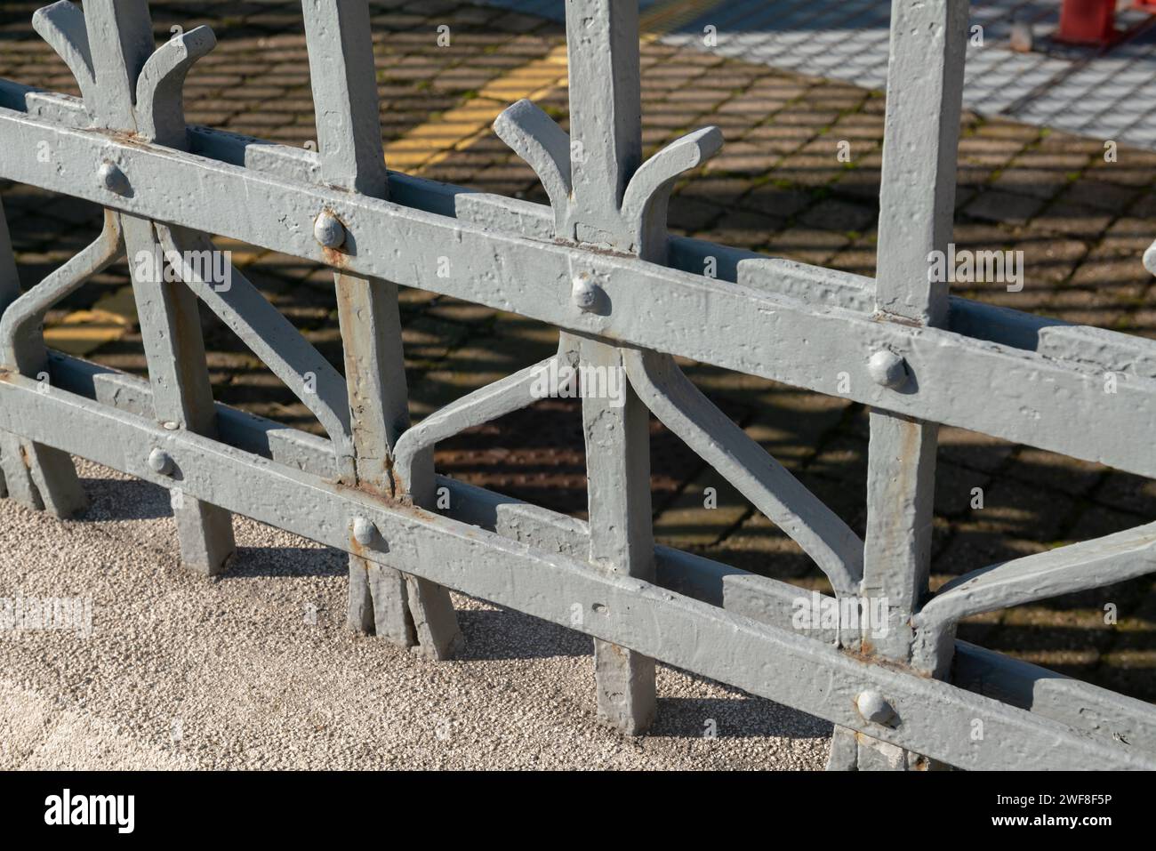 wrought iron railing, old factory gate with allegorical elements fixed ...