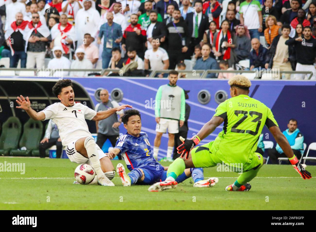 Al Rayyan, Qatar. 19th Jan, 2024. Youssef Amyn of Iraq and Yukinari ...
