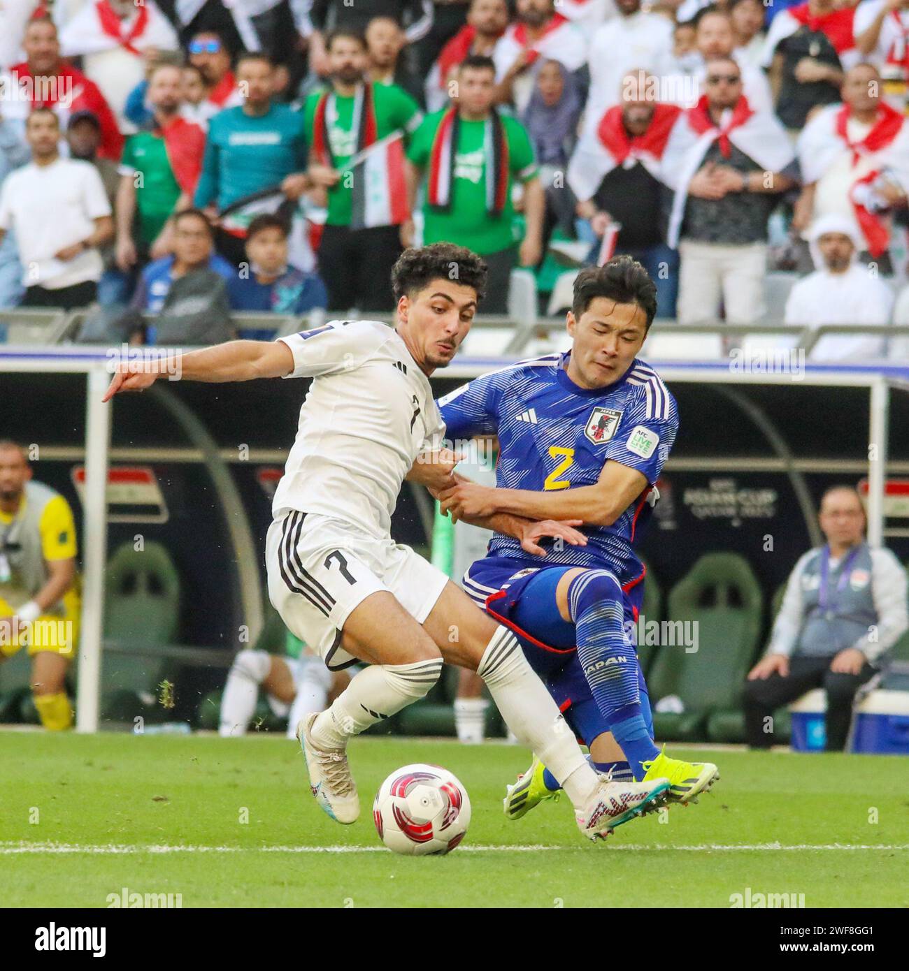 Al Rayyan, Qatar. 19th Jan, 2024. Youssef Amyn of Iraq and Yukinari ...