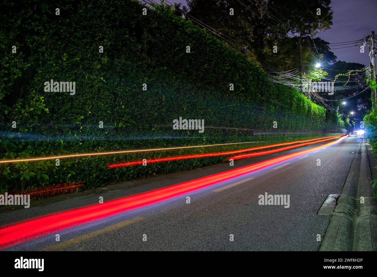 fast bright movement of a car on the road different colors Stock Photo ...
