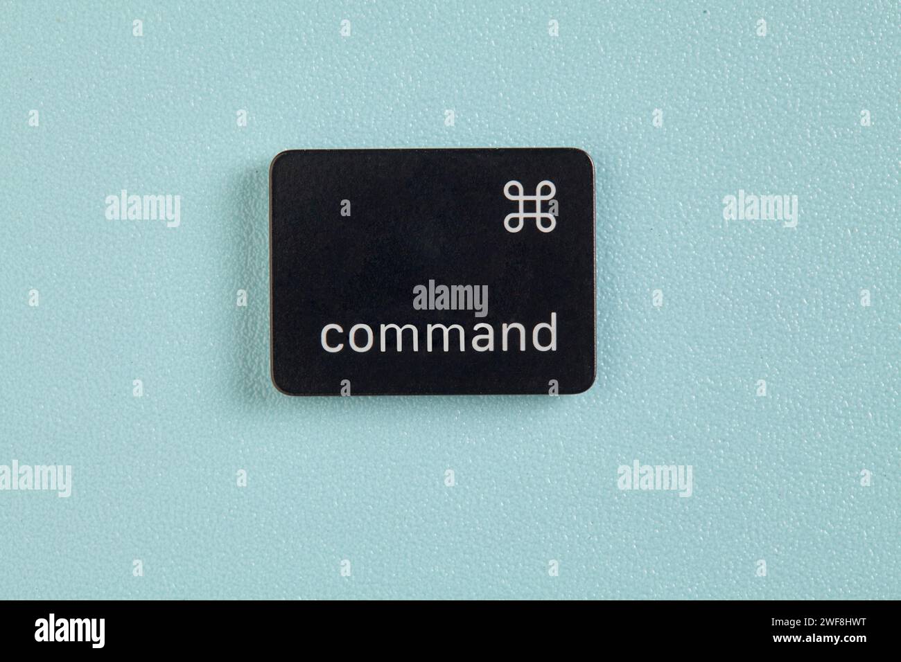 command key on blue background Stock Photo - Alamy