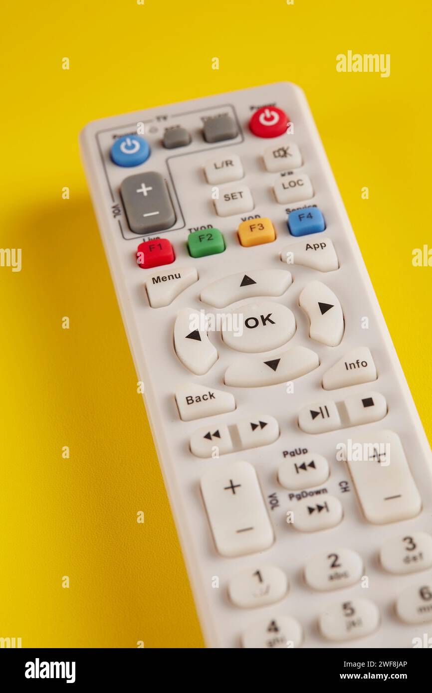 A TV box remote with various buttons Stock Photo - Alamy