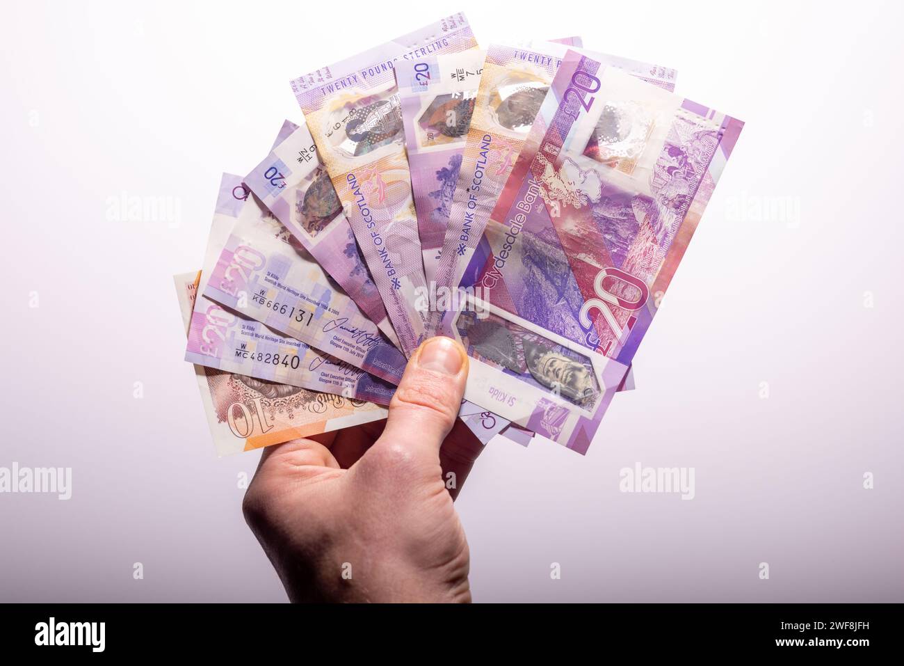 Sterling hands uk notes hi-res stock photography and images - Alamy