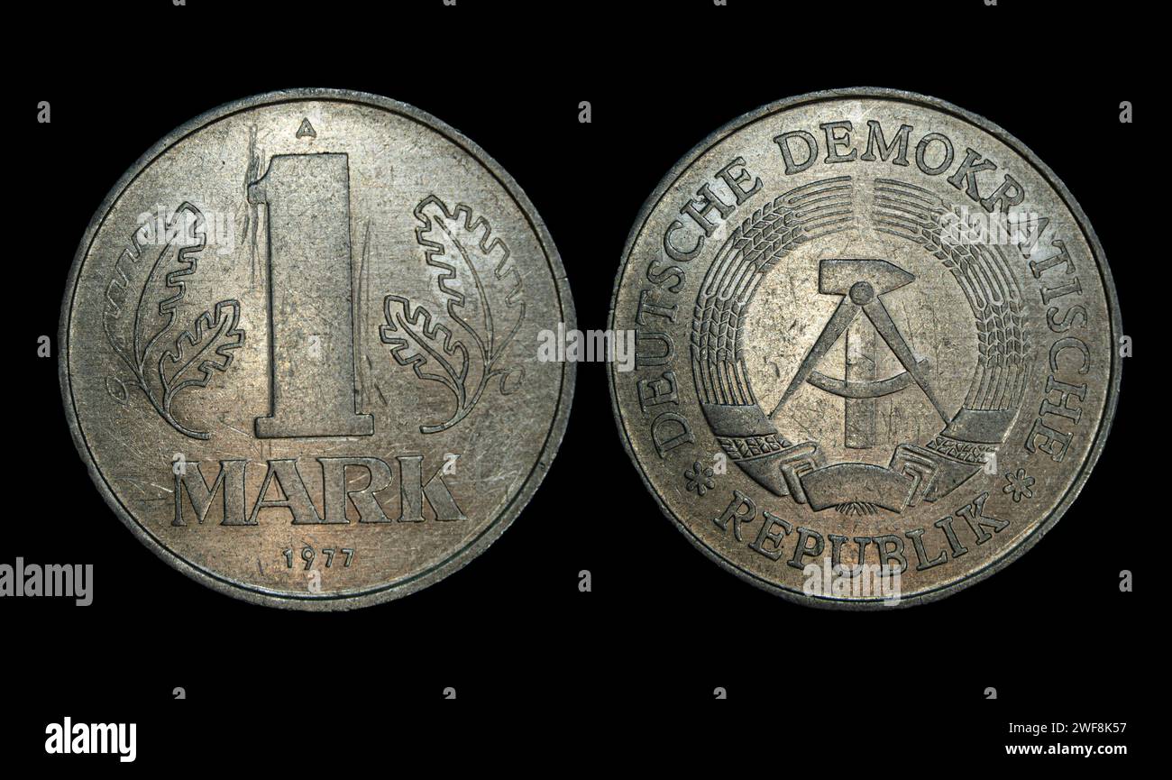 The Two East germany mark coins, DDR on a sleek black background Stock ...