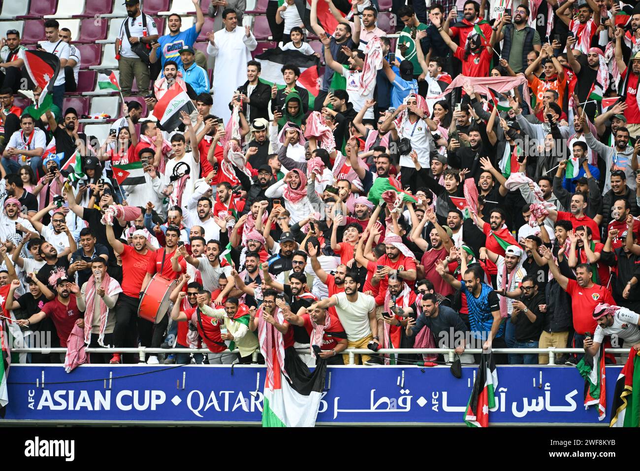 Doha, Qatar. 29th Jan, 2024. Jordan's supporters cheer after the round ...