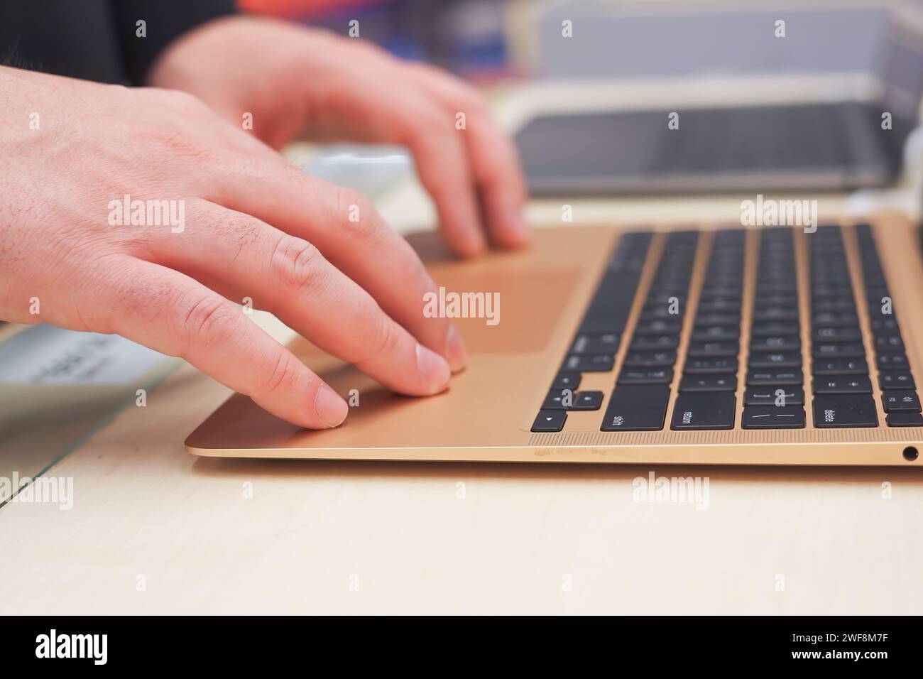 Buyer checking laptops in a computer store Stock Photo - Alamy