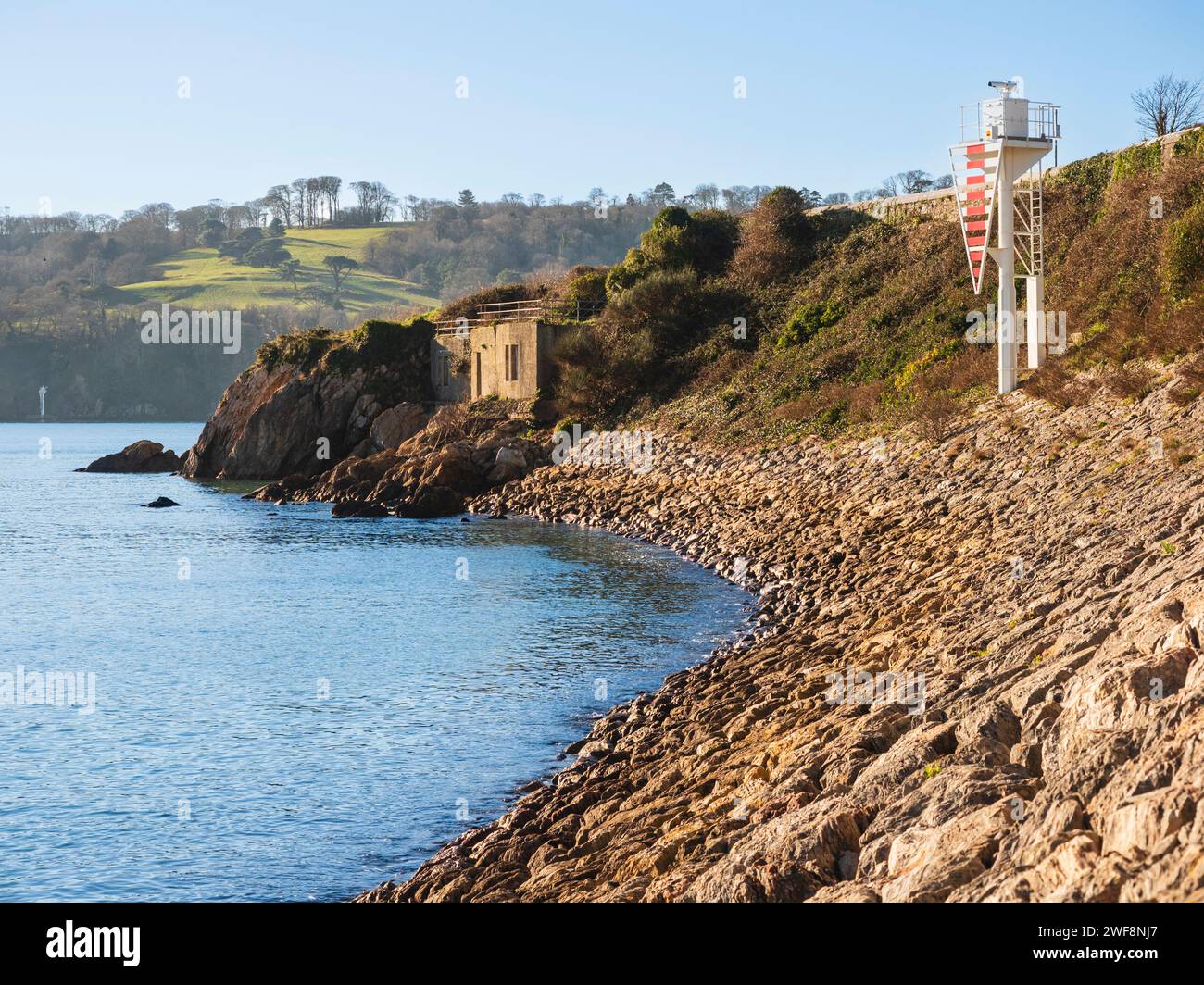 Rocky foreshore and navigation beacon at Mount Wise, Plymouth. Mount ...