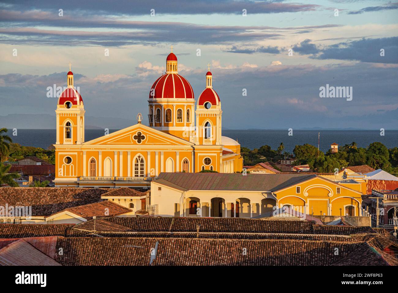 The beautiful neoclassical Granada Cathedral and the roofs of colonial ...
