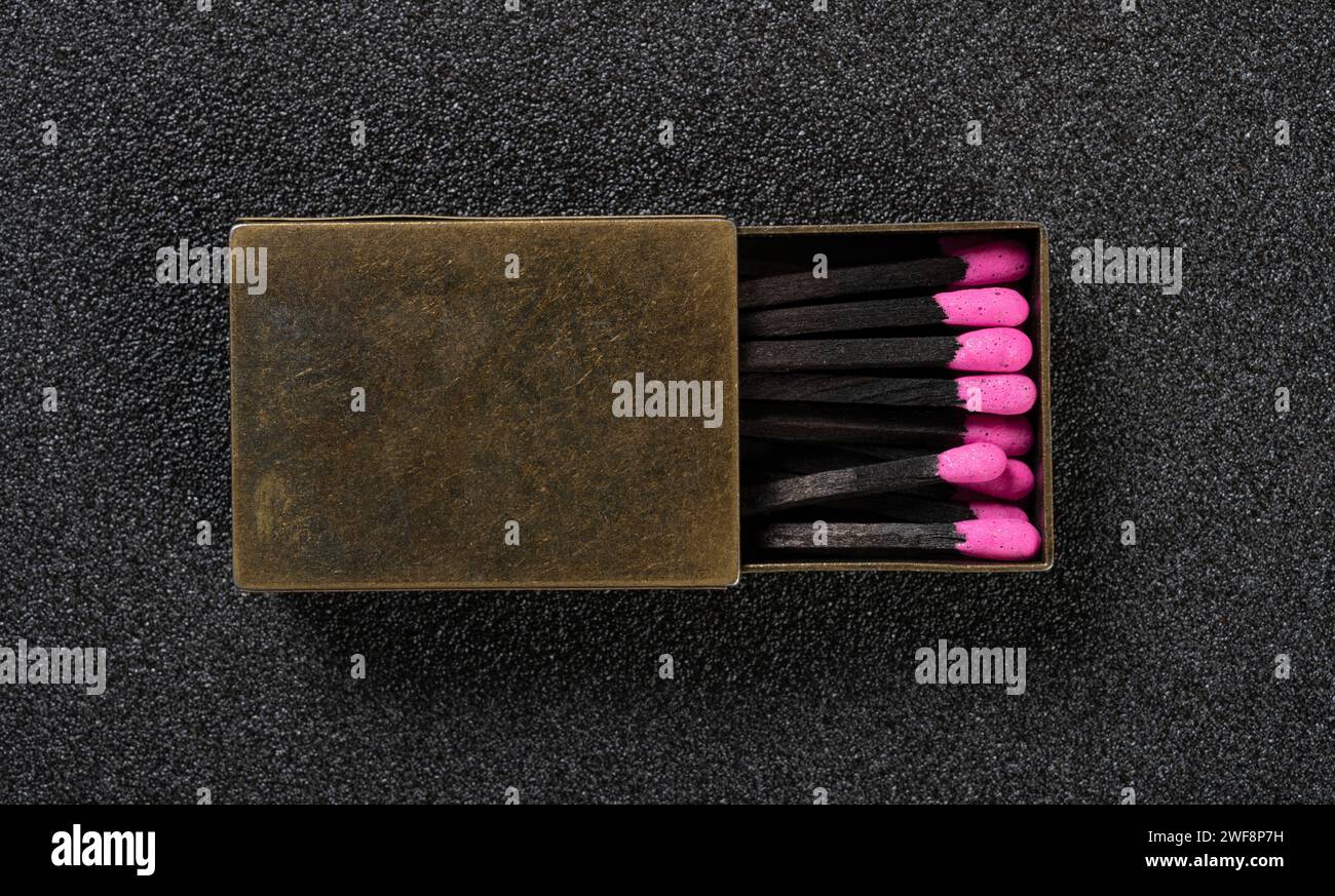 top view copper matchbox with pink color match sticks at horizontal composition Stock Photo - Alamy