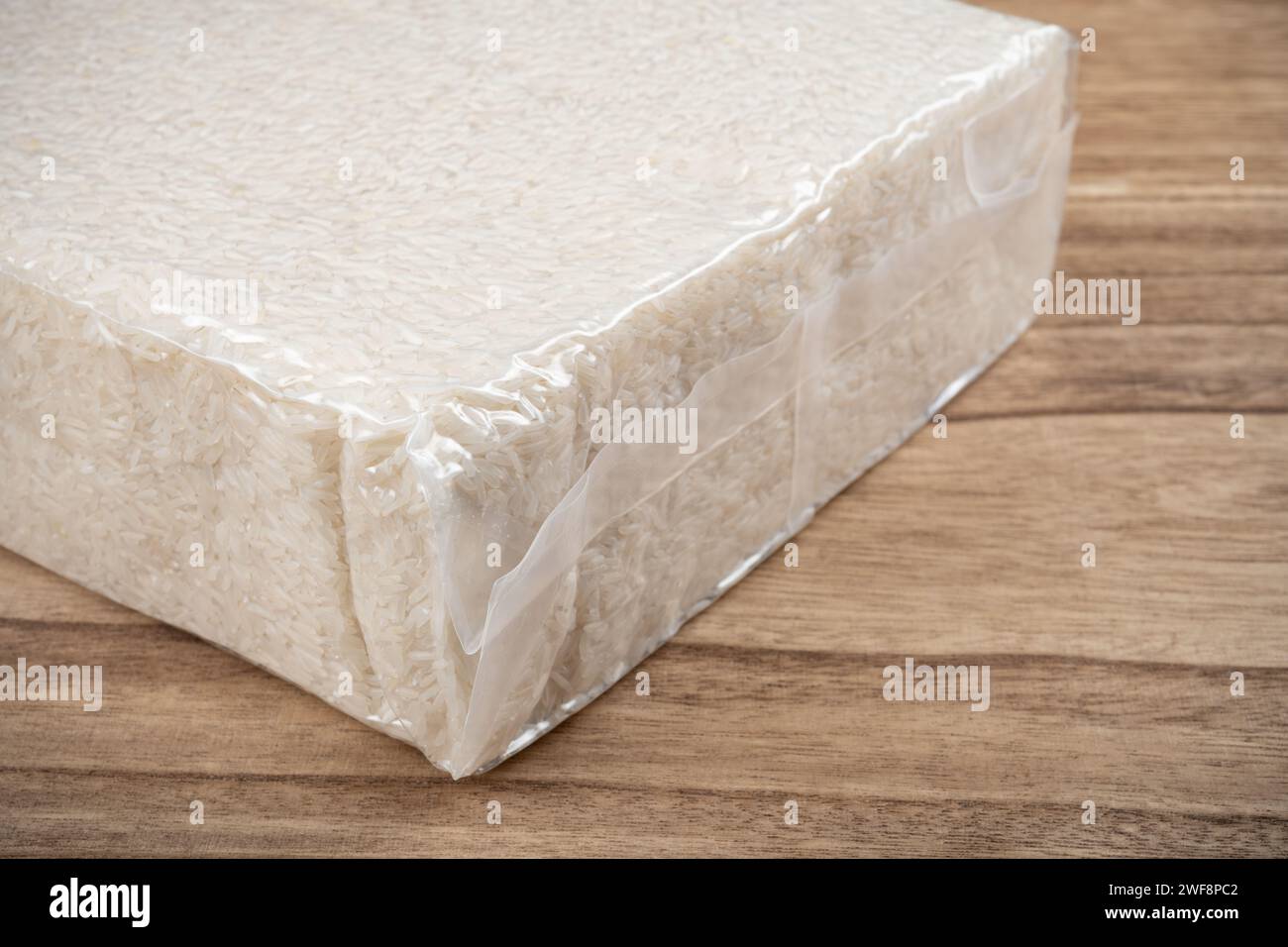 vacuum-packed bag of rice Stock Photo - Alamy