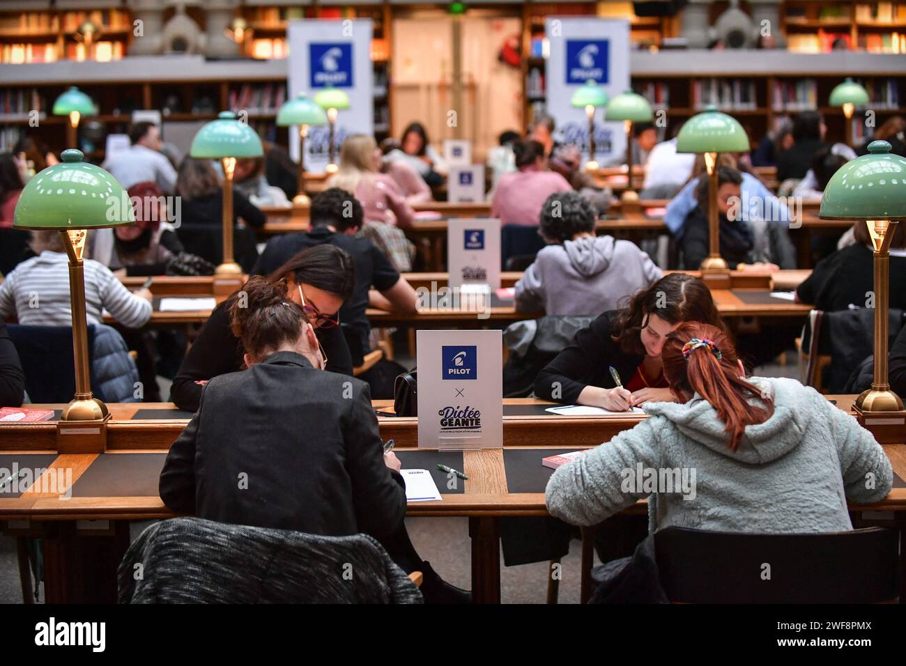 Paris, France. 29th Jan, 2024. Participants attend the Grand Dictation ...