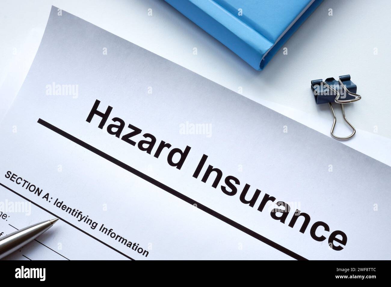 Hazard insurance policy form and pen Stock Photo - Alamy