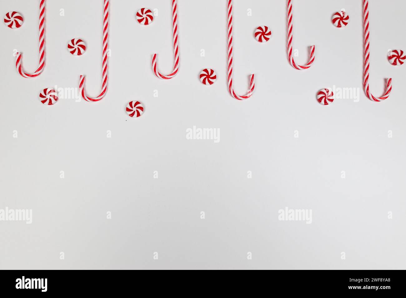 Christmas decoration and candies on snow Stock Photo - Alamy
