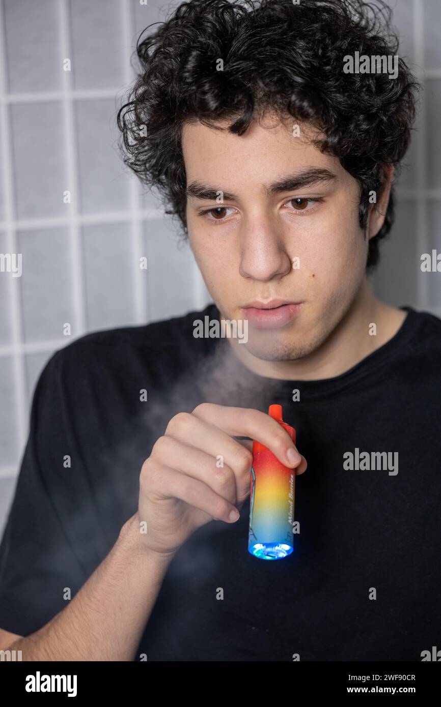 Boy with disposable vapes hi-res stock photography and images - Alamy