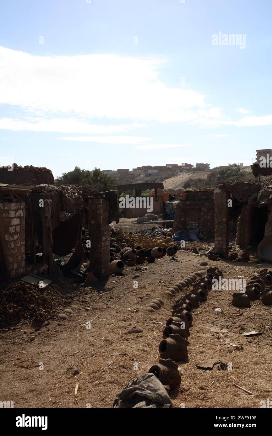 pottery, houses, rubish in a village Stock Photo - Alamy