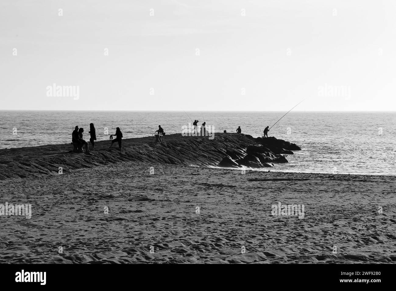 People relaxing on the beach in Rota city, Cadiz Stock Photo - Alamy
