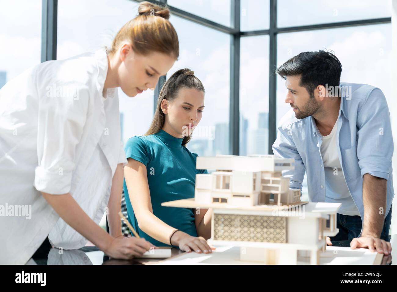 Professional diverse architect engineer team working together to design ...