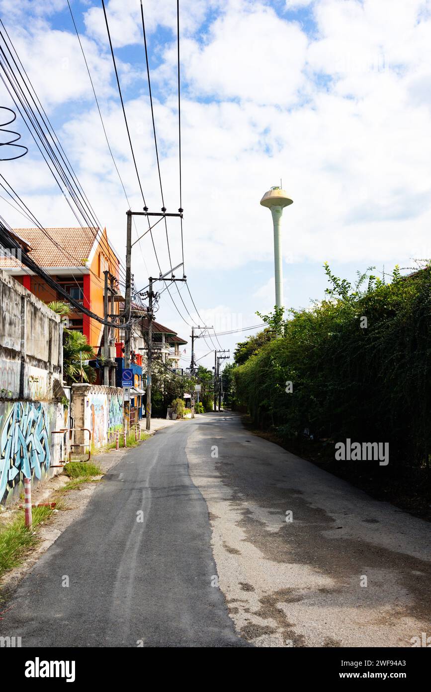 A bustling street featuring vibrant and intricate graffiti art adorning ...