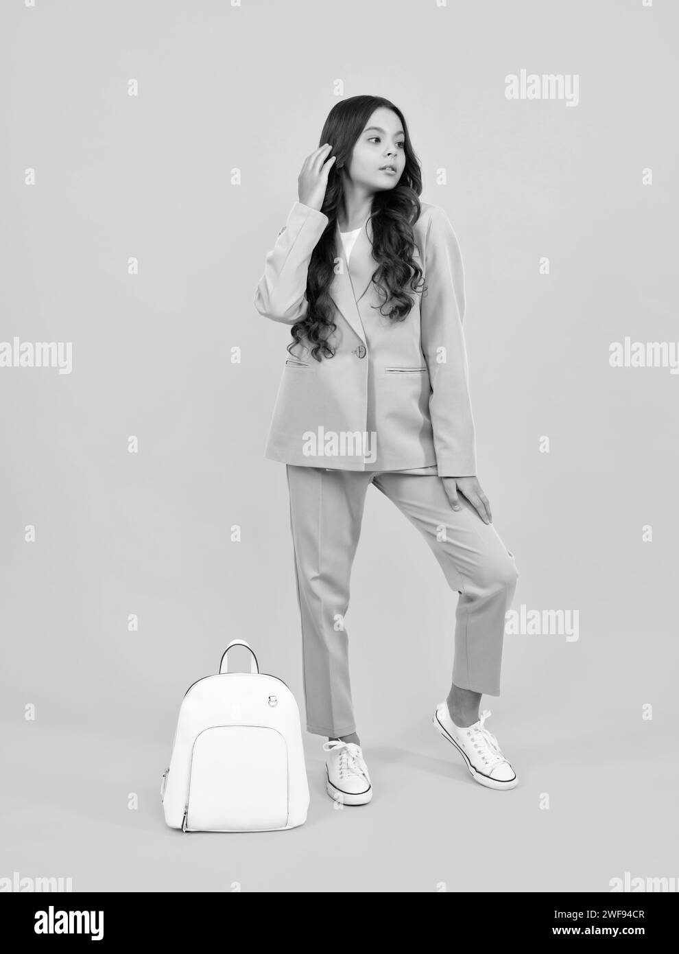 Schoolgirl with backpack. Teenager student, isolated background ...