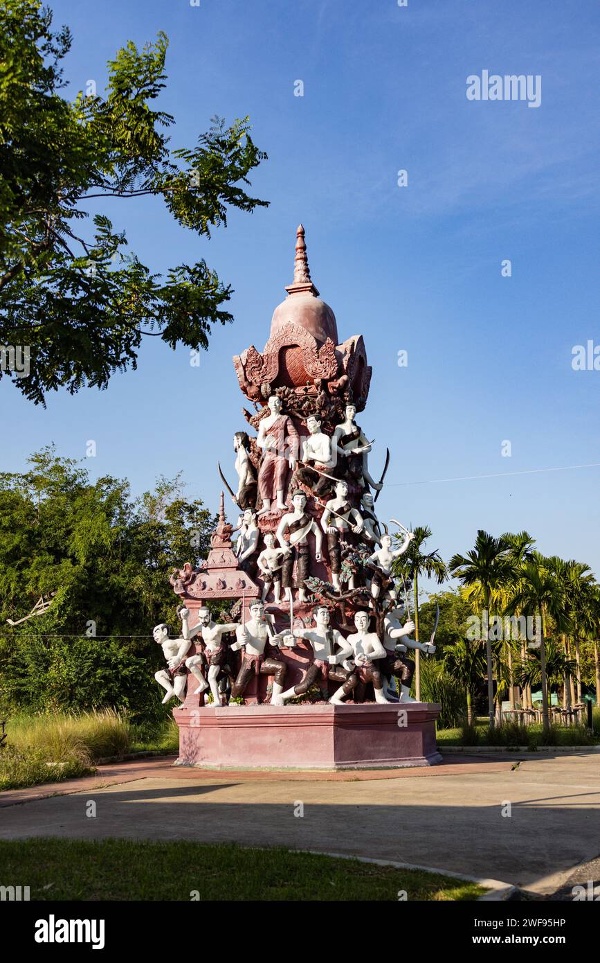 A statue of Buddha surrounded by birds, with the birds perched on his ...