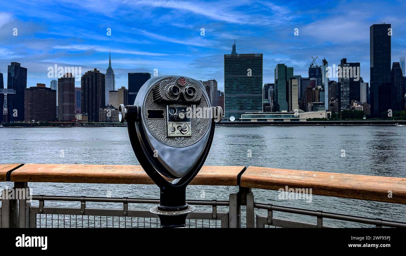 Binoculars on the pier viewer and observer Long Island is an island ...