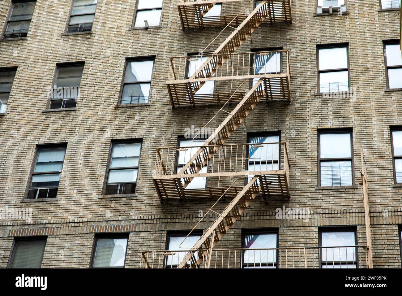 Typical brick facades and emergency stairs in the Bronx neighborhood of ...