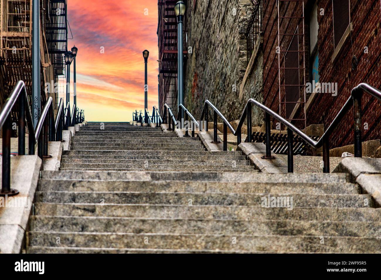 The stairs of the Joker in an orange sunrise or sunset in the famous ...