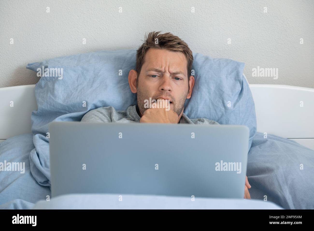 Businessman laying on bed hi-res stock photography and images - Alamy