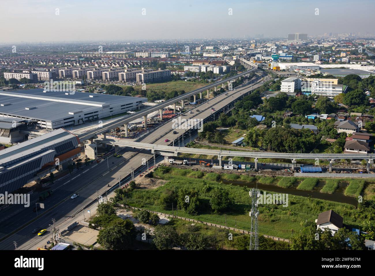 This aerial photo captures the sprawling cityscape with a prominent ...