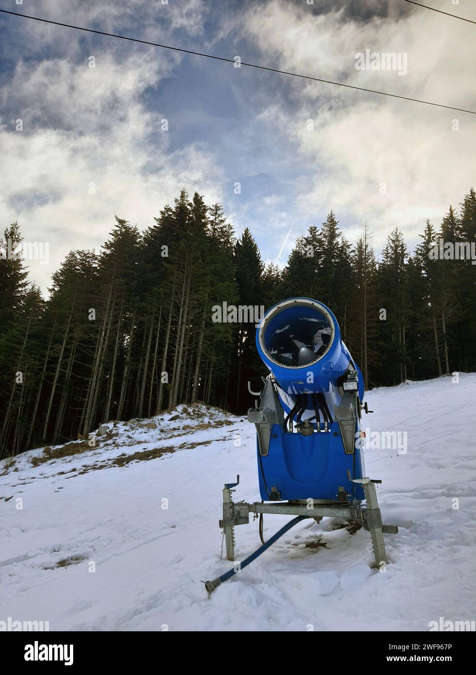 Snow making machine on the ski resort Stock Photo - Alamy