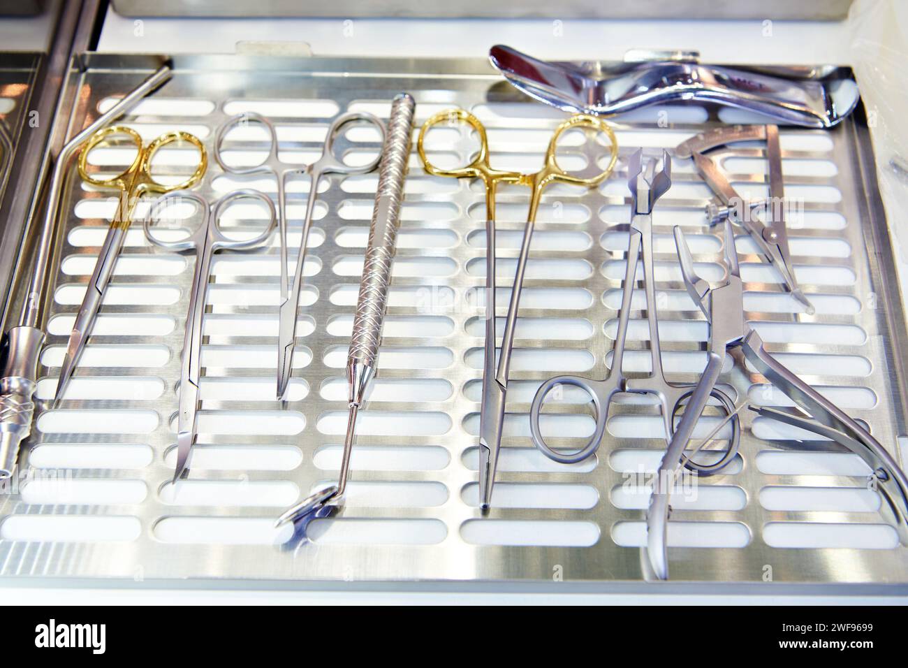 Dental instruments, scissors, clamps and mirror Stock Photo - Alamy
