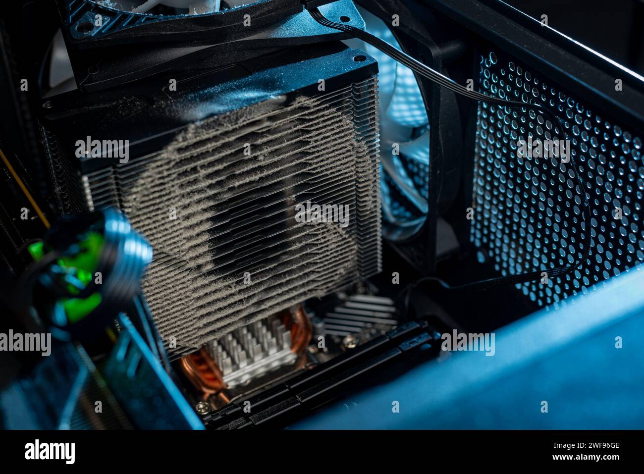 Dust inside of a broken computer. complication of the PC. fan and other ...