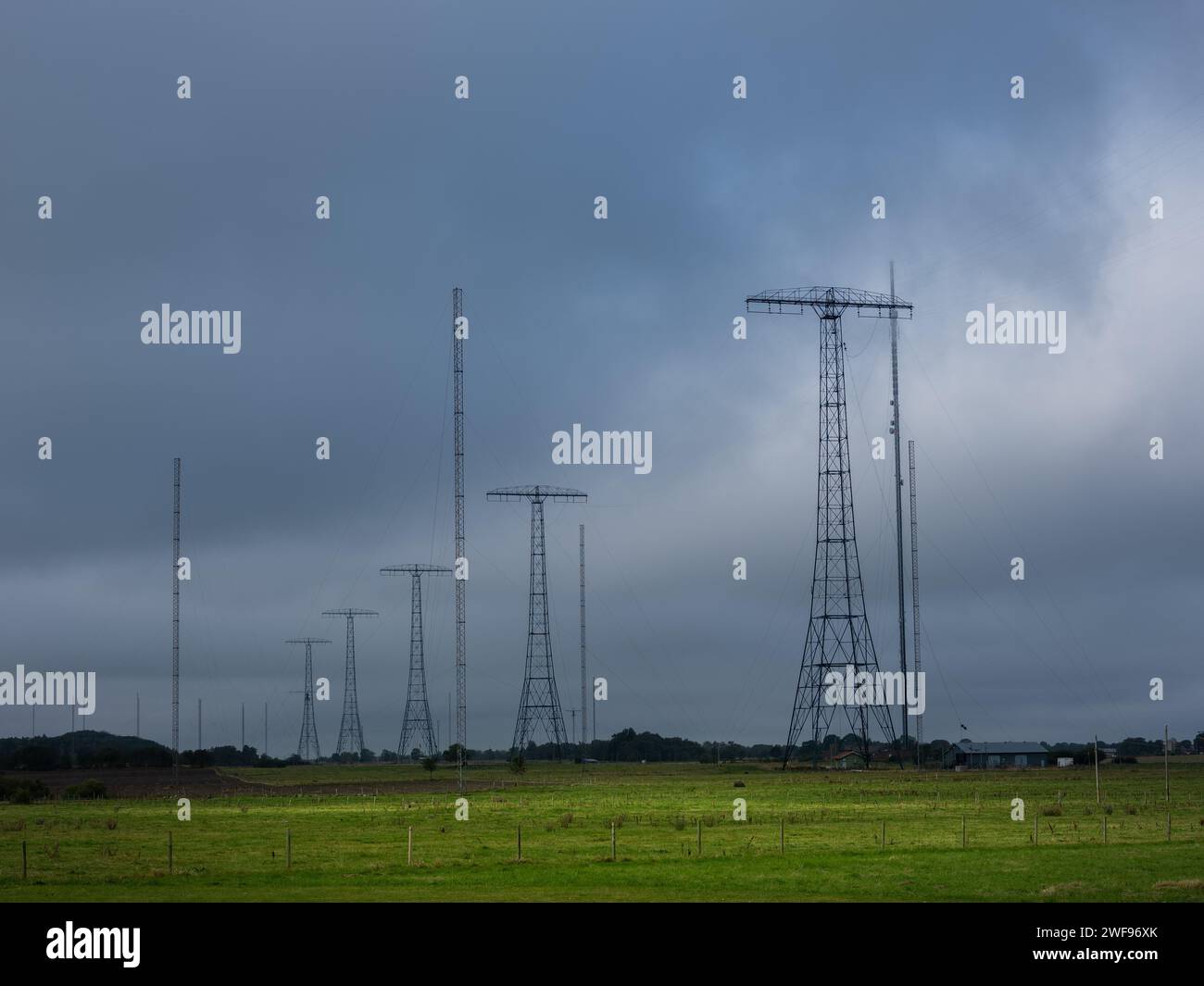 Large radio antenna pylons on a field Stock Photo - Alamy