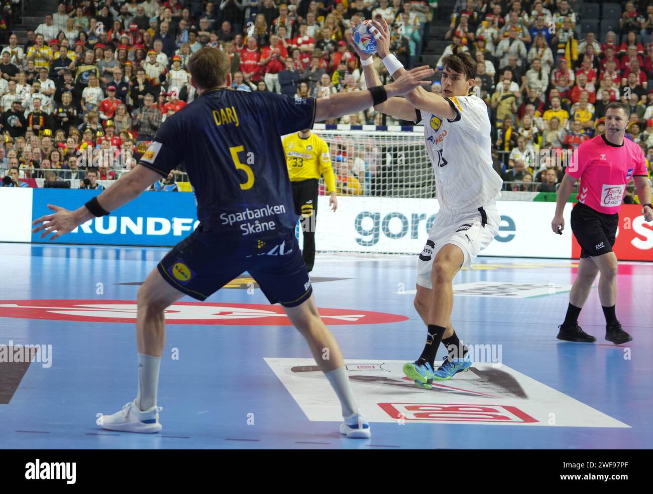 Julian Koster of Germany and Max Darj of Sweden during the Men's EHF ...
