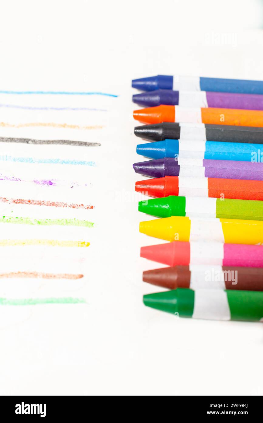 many colorful crayons isolated on white background Stock Photo - Alamy